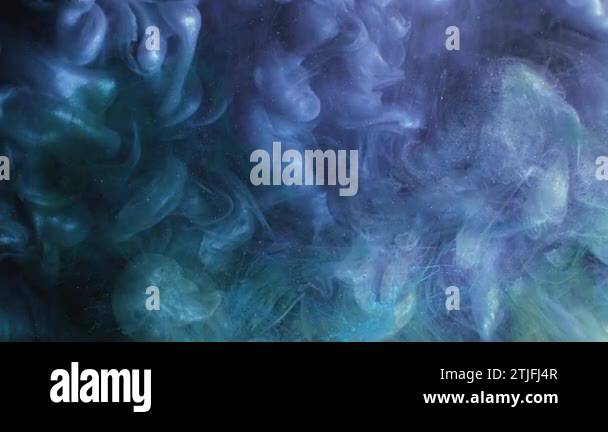 Fluid splash. Ink water. Paint drop. Underwater explosion. Blue purple ...