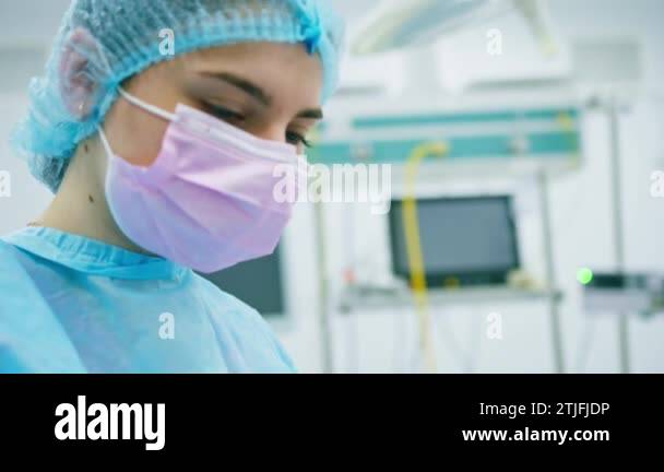 the face of a sad surgeon in a sterile mask who could not save the ...