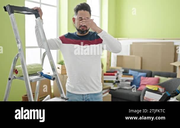 Leaning on ladder Stock Videos & Footage - HD and 4K Video Clips - Alamy
