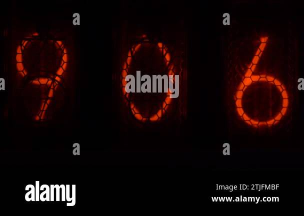 Retro vacuum tube display on the device counts seconds. Displaying ...