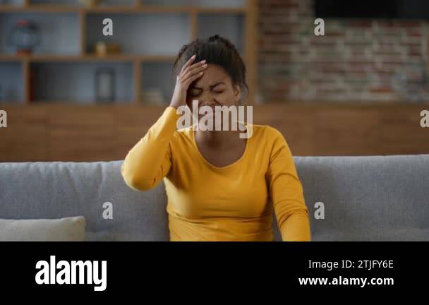 Weather dependance concept. Indoors portrait of young upset african ...