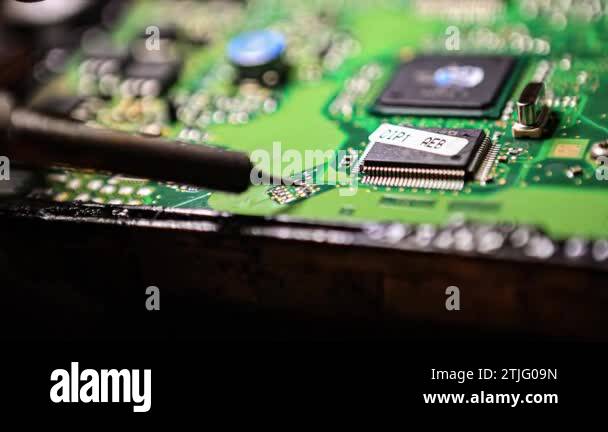 Car Ecu Detail with visible components with hand that repair it. Car ...