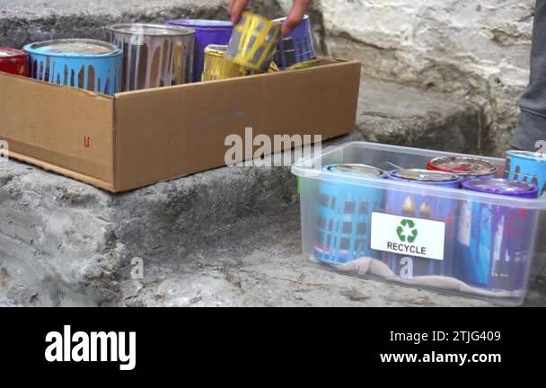 Empty metal paint cans are made of steel. Building waste. Metall ...