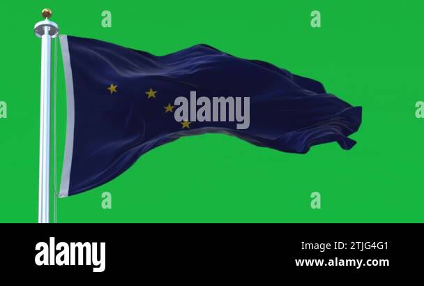Alaska state flag waving in the wind isolated on a green background ...