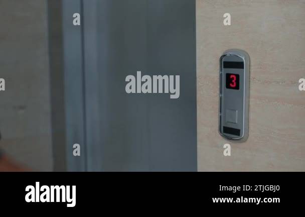 Confident man encountering evil zombies at elevator when leaving work ...