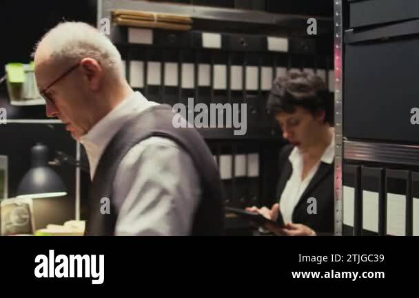 Officers carrying out detective work together with classified police ...