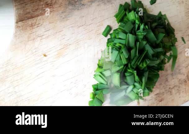 Stir sliced Garlic Chives and Ingredients for making steamed dumpling ...