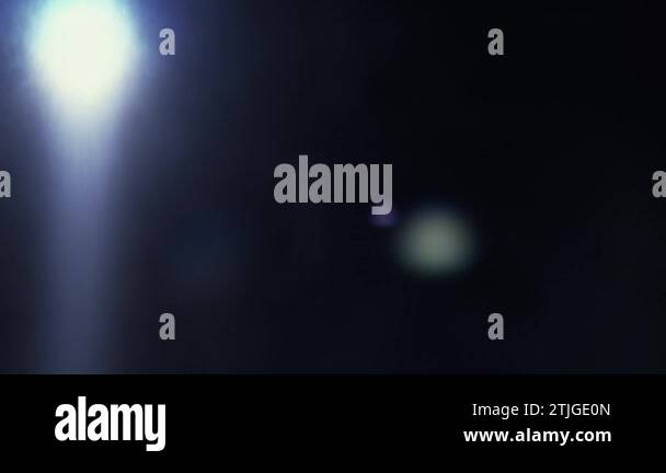 Real lens flare. Sun motion effect. Moving light circle and beams on ...