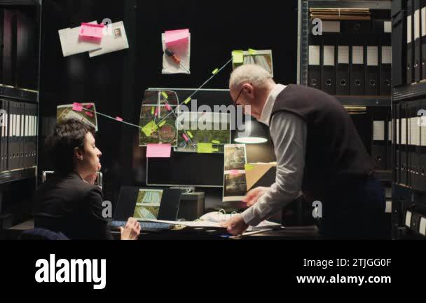 Partners gather criminal intelligence on clues board, teamwork to solve ...