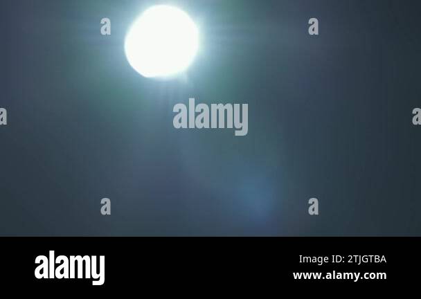 Real lens flare. Sun motion effect. Moving light circle and beams on ...