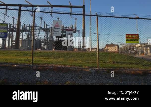 High voltage substation with pylons and distribution cables ...