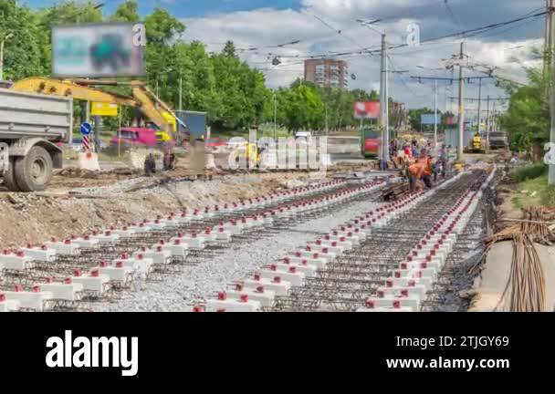 Repair works on the street timelapse. Laying of new tram rails on a ...