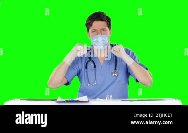 Dancing celebrating funny medical doctor with fun energy. Green screen ...