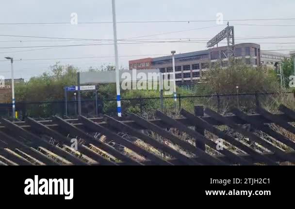 Outside View from Window Seat of Train Moving Fast to Approach Next ...