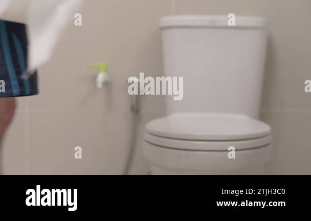 man use toilet has severe abdominal pain. The man is having diarrhea in ...