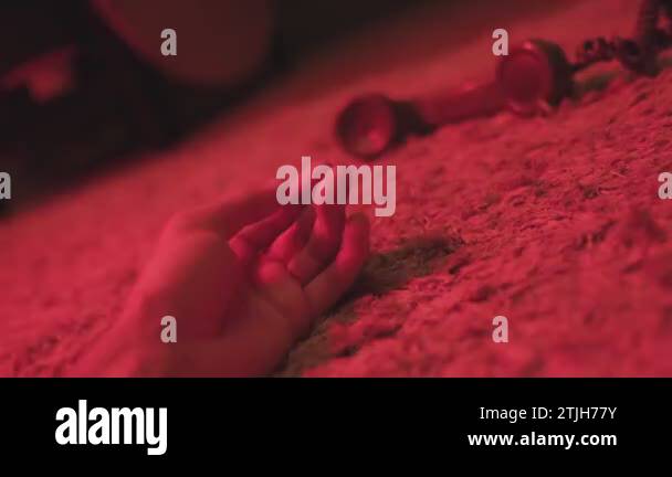 Crime scene like footage, close up footage of a phone someone hand and ...