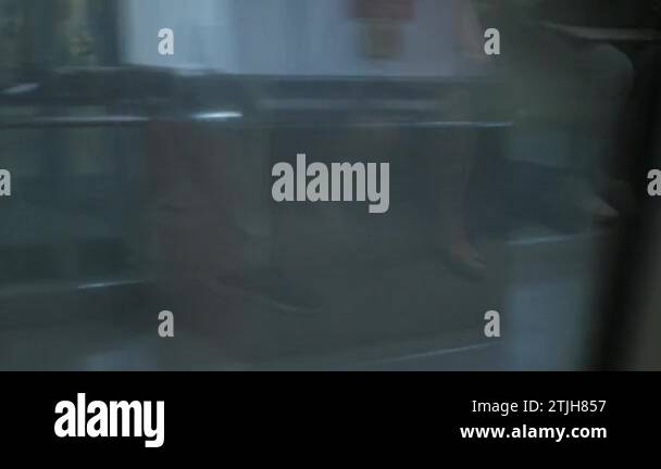 An interior selected focus view at window on subway's door, view of the ...
