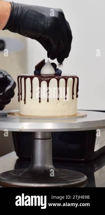 Chef topping icing drip cake Stock Videos & Footage - HD and 4K Video ...