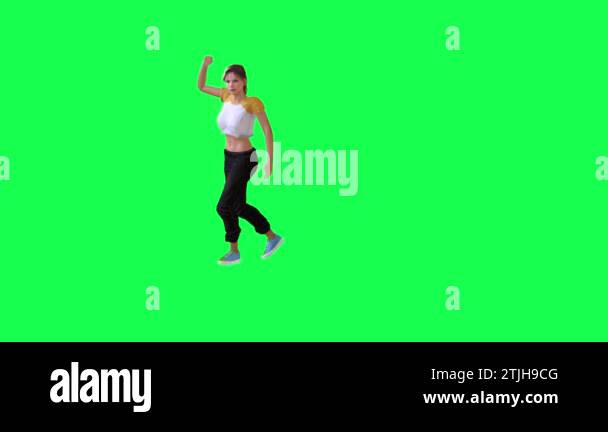 The winning sportswoman runs enthusiastically and cheers from the ...