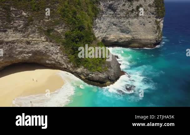 Dramatic aerial drone footage of the famous Kelingking beach, aka T Rex ...