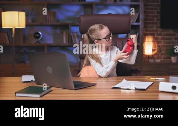 Overworked school girl spending too much time with personal laptop and ...