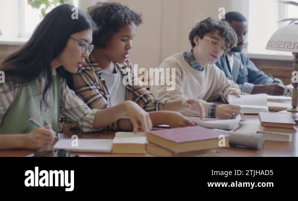 Reading and writing men and women Stock Videos & Footage - HD and 4K ...