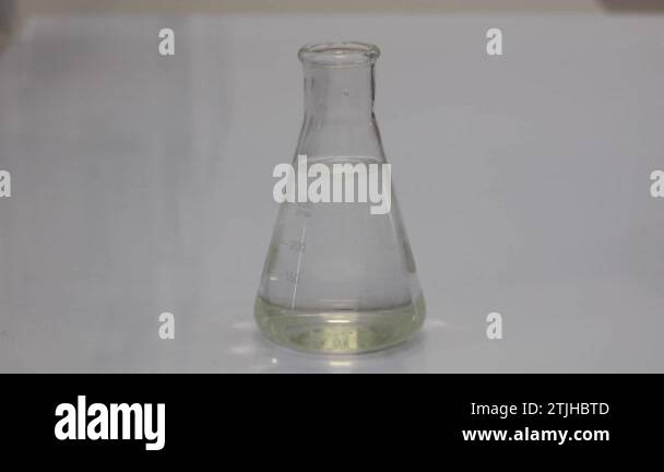 Mixing colored solution with a magnetic stirrer. Formation of a ...