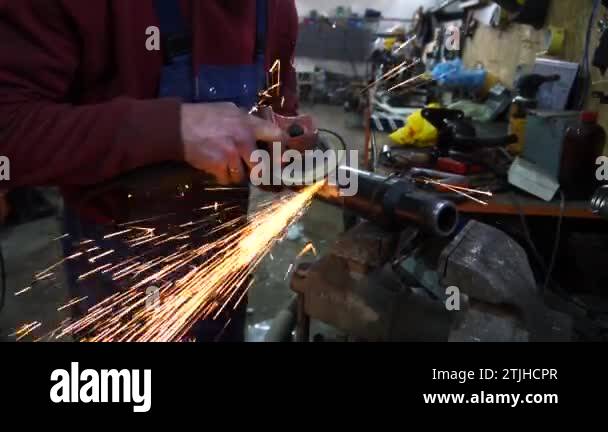 cutting metal and making custom parts for installing a car engine Stock ...