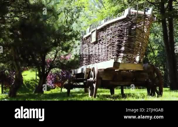 Rustic wagon wheel wooden garden bench Stock Videos & Footage - HD and ...