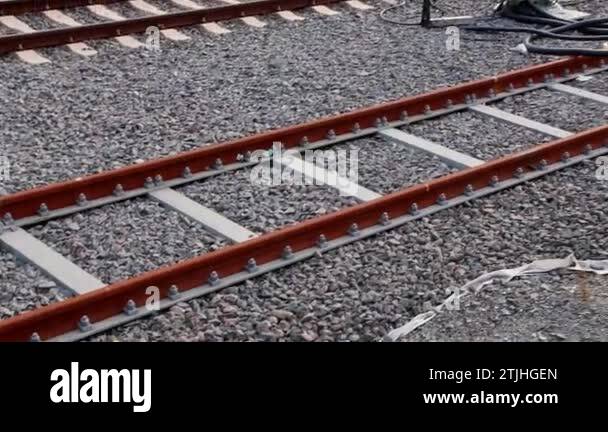 Rusty railway end in urban train station shows end of way in railway ...