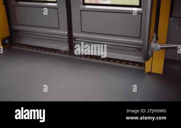 Automatic tram doors open at the tram stop. urban public transport ...