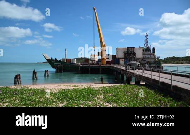 SEISIA, QLD - JUNE16 2023:Sea Swift ship loading cargo at Seisia wharf ...