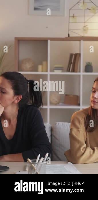 Vertical video. Family quarrel. Home conflict. Smiling mother teenage ...