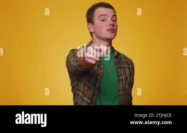 Great job, nice. Cheerful positive happy teen man in shirt showing ...