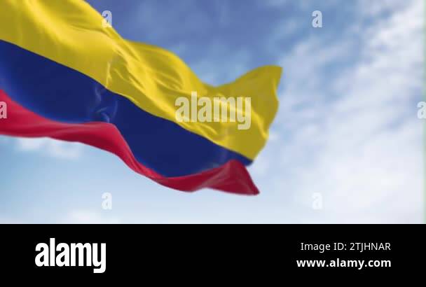 Colombia national flag waving in the wind on a clear day. Horizontal ...