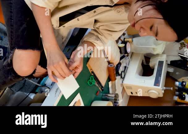 art workshop, messy objects, brushes, color palette, paint all mixed up ...