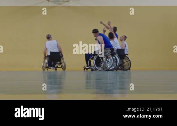 Wheelchair Basketball Game: Players Compete, Dribbling Ball, Passing ...