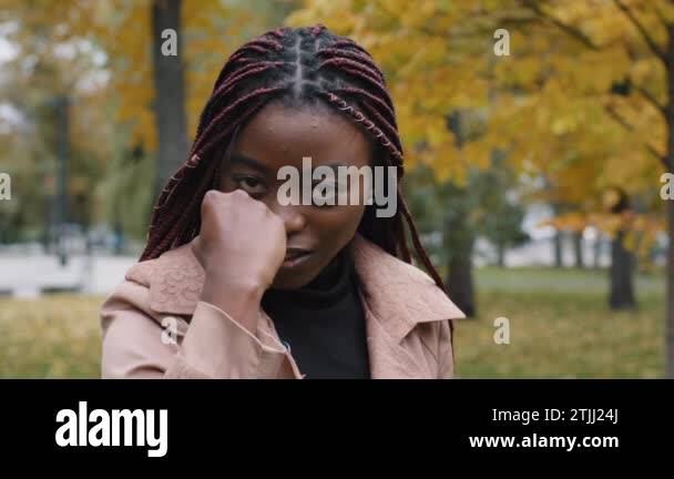 Close-up angry aggressive african american woman looking at camera ...