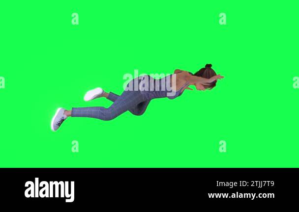 Falling moment of young slim woman in gray clothes from left angle on ...