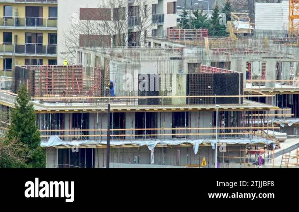 Construction site works of residential building, rebar tying, formwork ...