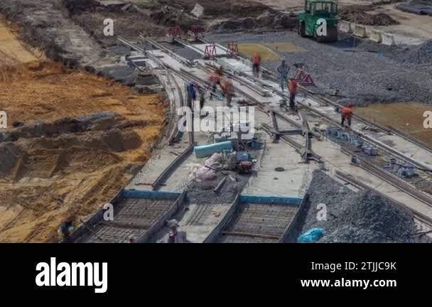 Repair works with reinforcement on the street aerial timelapse. Laying ...