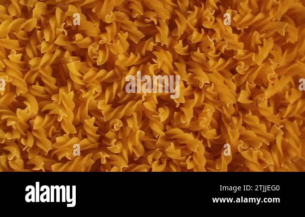 Uncooked Fusilli Pasta - Top View, Low Key Light. Fat and Unhealthy ...
