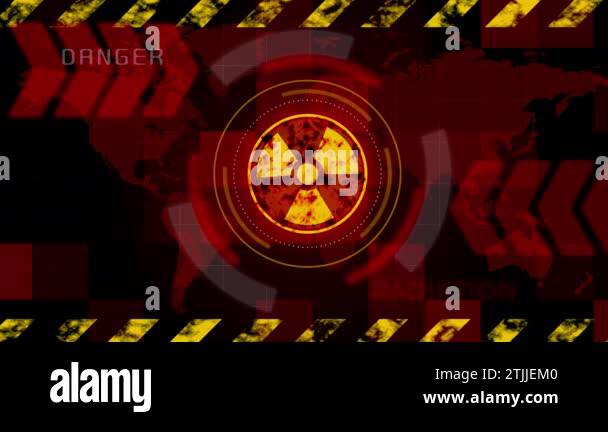 Glowing nuclear symbol. Red screen with message of radioactive danger ...