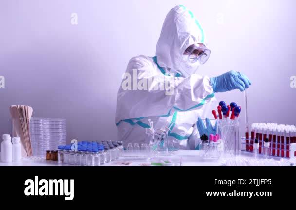 Medical laboratory with equipment and Microbiology scientist wearing ...