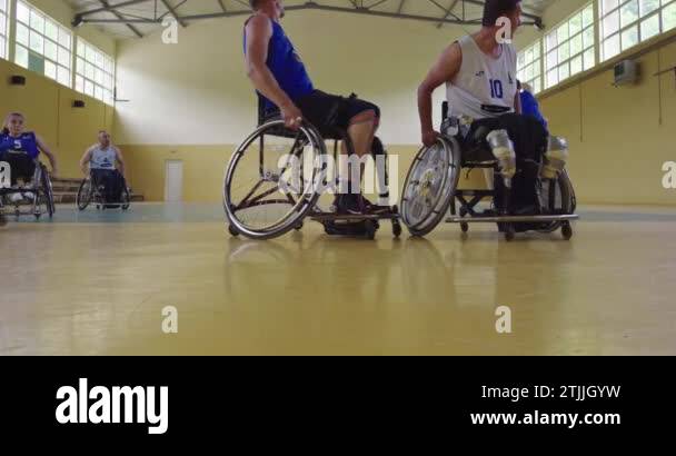 Wheelchair Basketball Game: Players Compete, Dribbling Ball, Passing ...