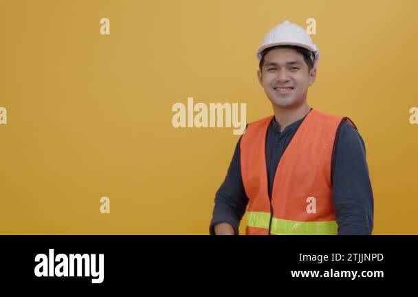 Engineers wear safety on color back ground. The inspectors crossed ...