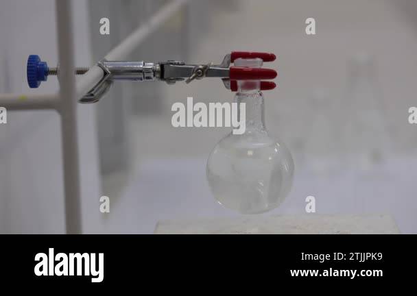 Mixing colored solution with a magnetic stirrer. Formation of a ...