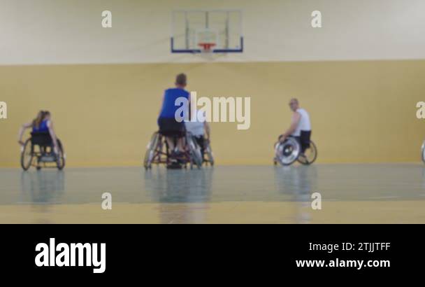 Wheelchair Basketball Game: Players Compete, Dribbling Ball, Passing ...