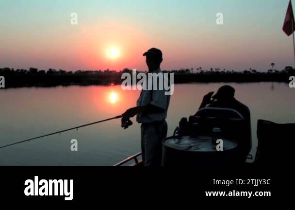 Fishing in okavango delta sunset Stock Videos & Footage - HD and 4K ...