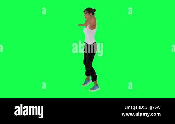 Beautiful young woman in white dress black pants and blue shoes dancing ...